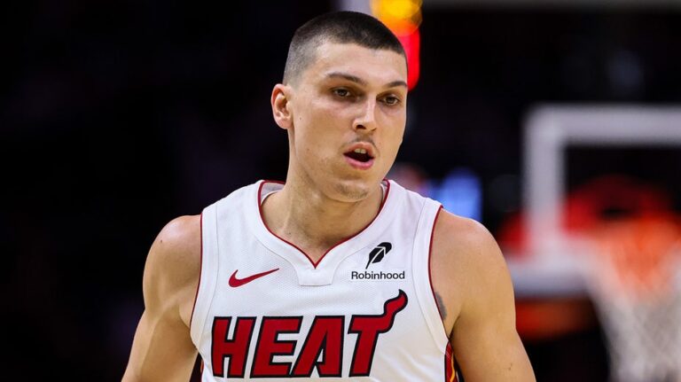Heat's Tyler Herro gets distracted as fans fight in stands after game ...