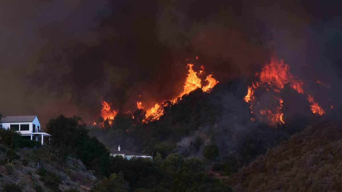 Second Los Angeles-area fire breaks out as firefighters battle raging ...