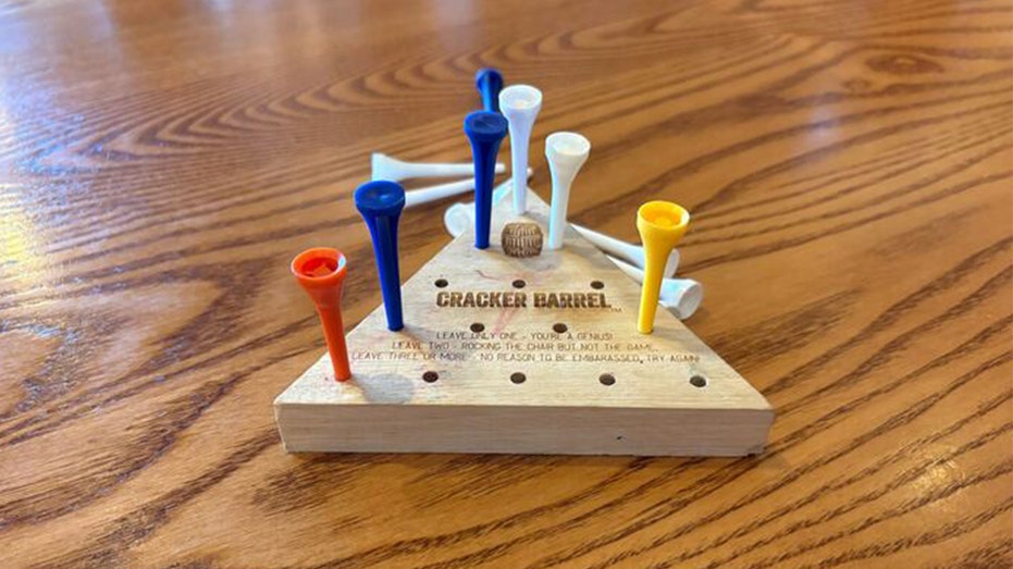 Cracker Barrel's changed language on famous peg game in rebrand sparks ...