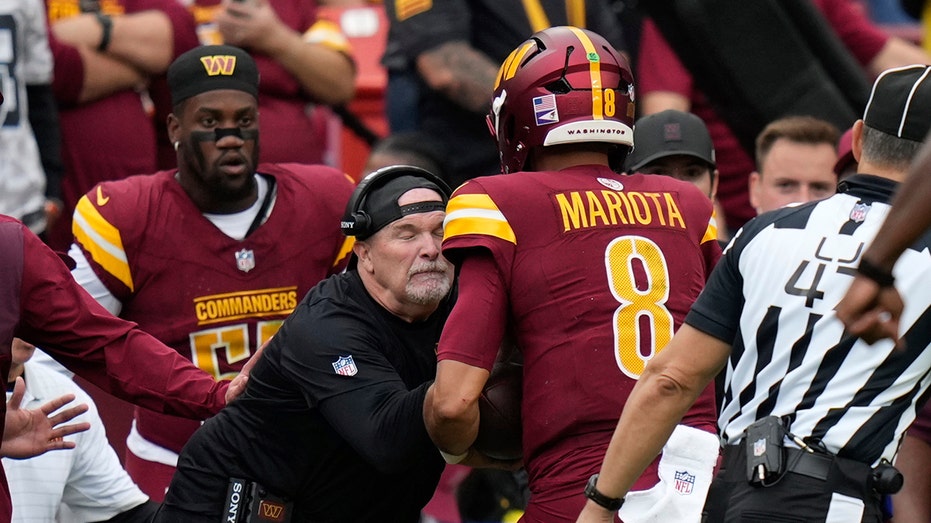 Commanders' Dan Quinn left bloodied after quarterback runs into him ...