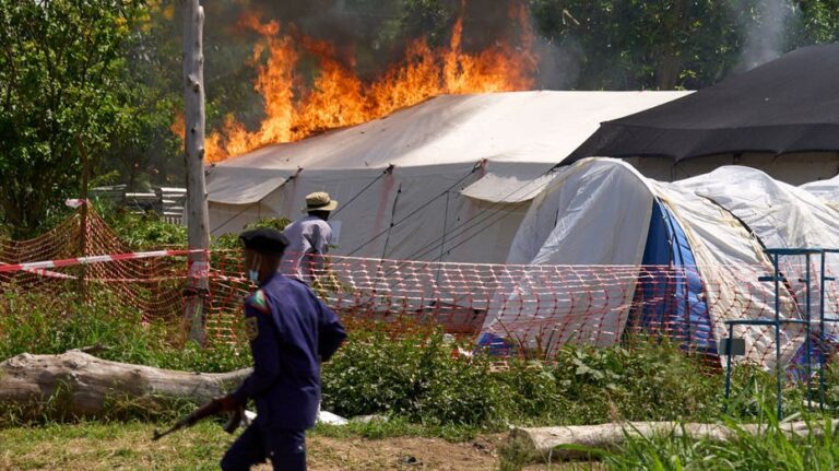 Ebola treatment center set on fire in Congo after residents clash with ...